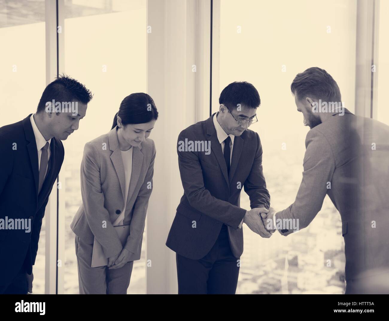 Business Partners Introductionary Handshake Bow Stock Photo - Alamy