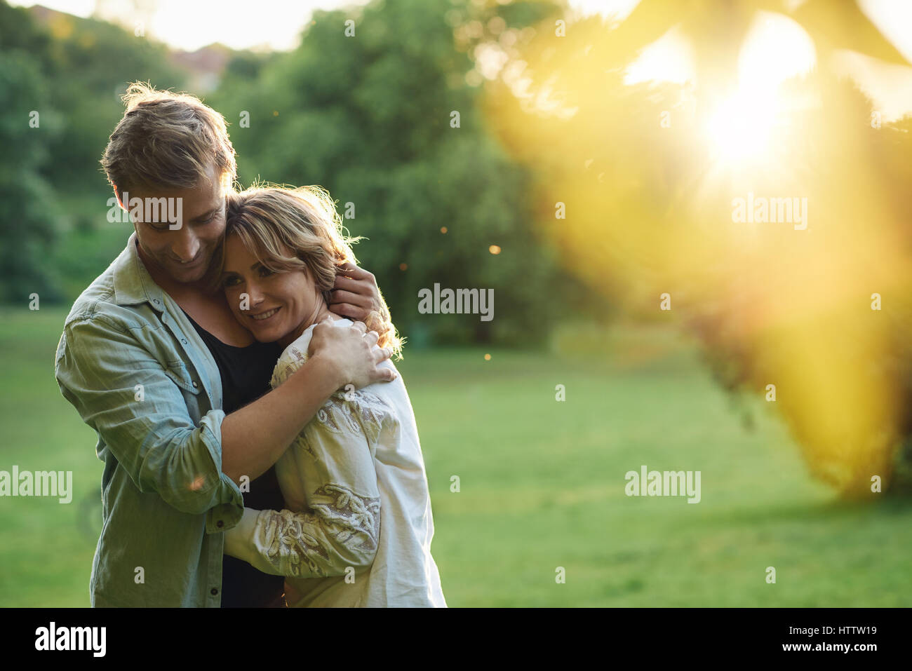 Affectionate couple enjoying moment together hi-res stock photography ...
