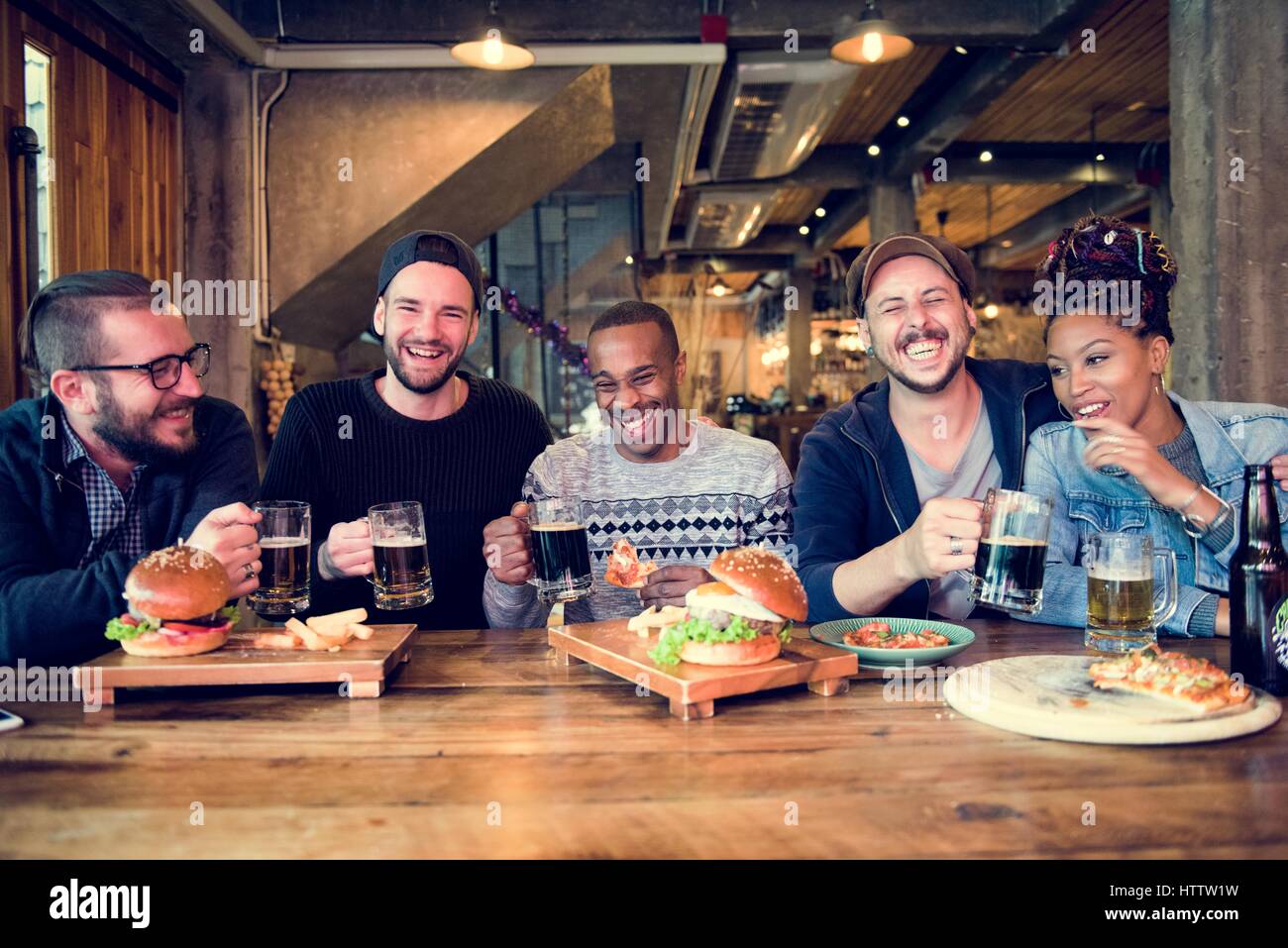 Diverse People Enjoy Food Drinks Party Restaurant Stock Photo - Alamy
