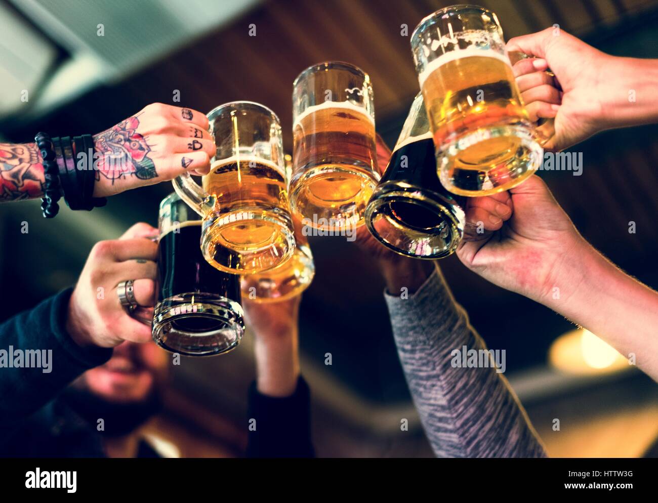 Hands Hold Beverage Beers Bottle Cheers Stock Photo - Alamy