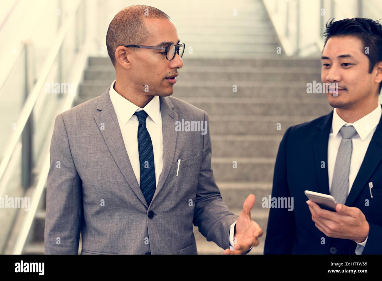 Male friends mobile talk hi-res stock photography and images - Alamy