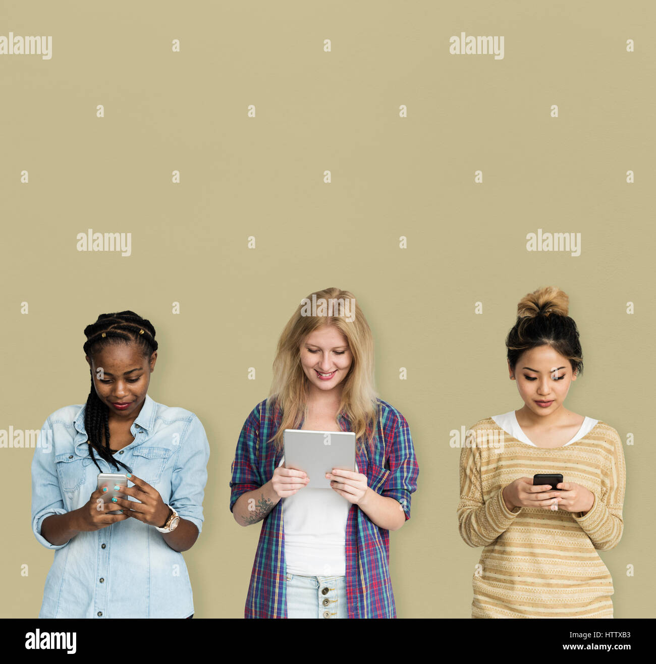 Group of Girls Using Technology Gadgets Stock Photo - Alamy
