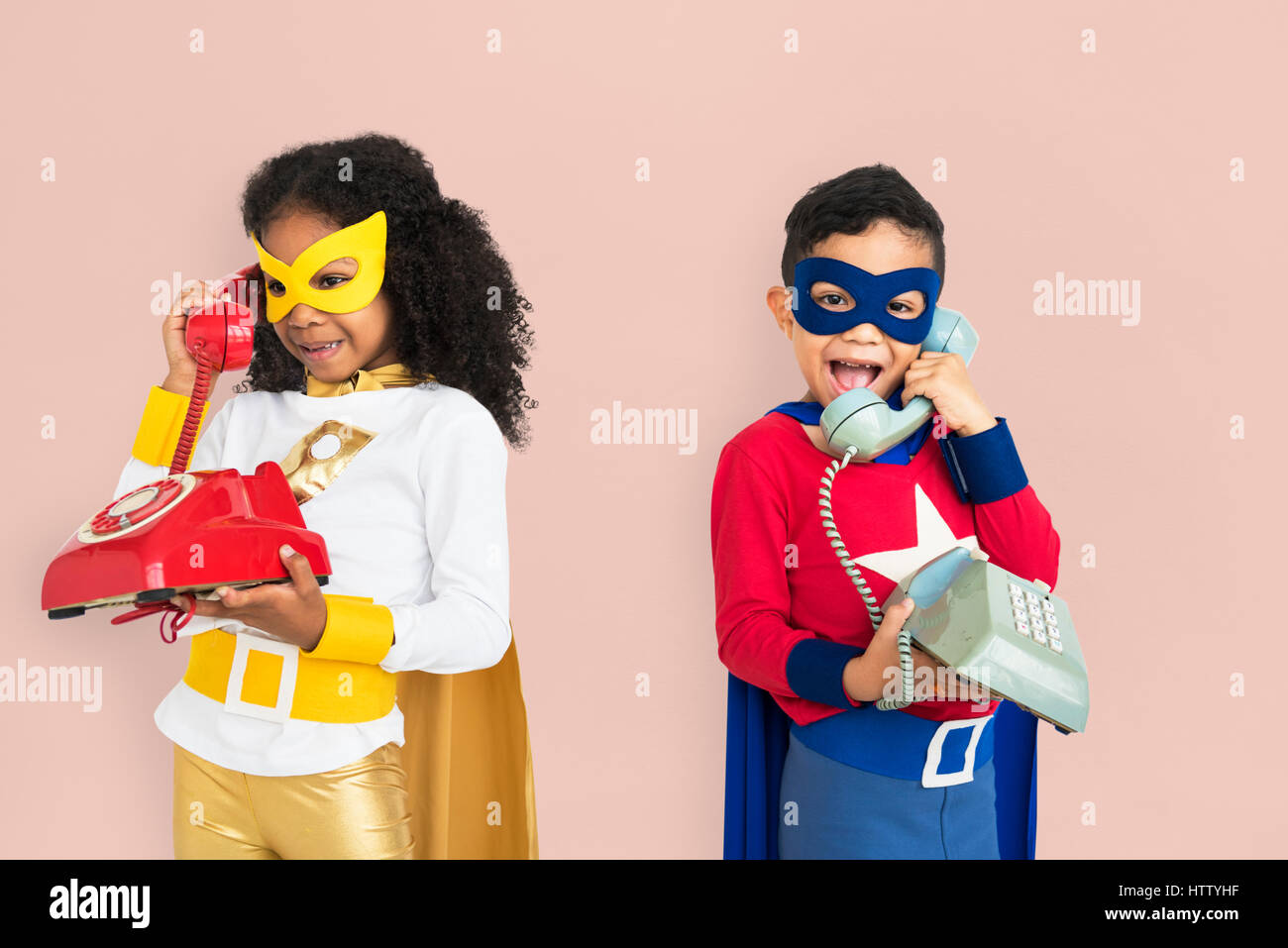 Superhero Kids with Telephone Concept Stock Photo - Alamy