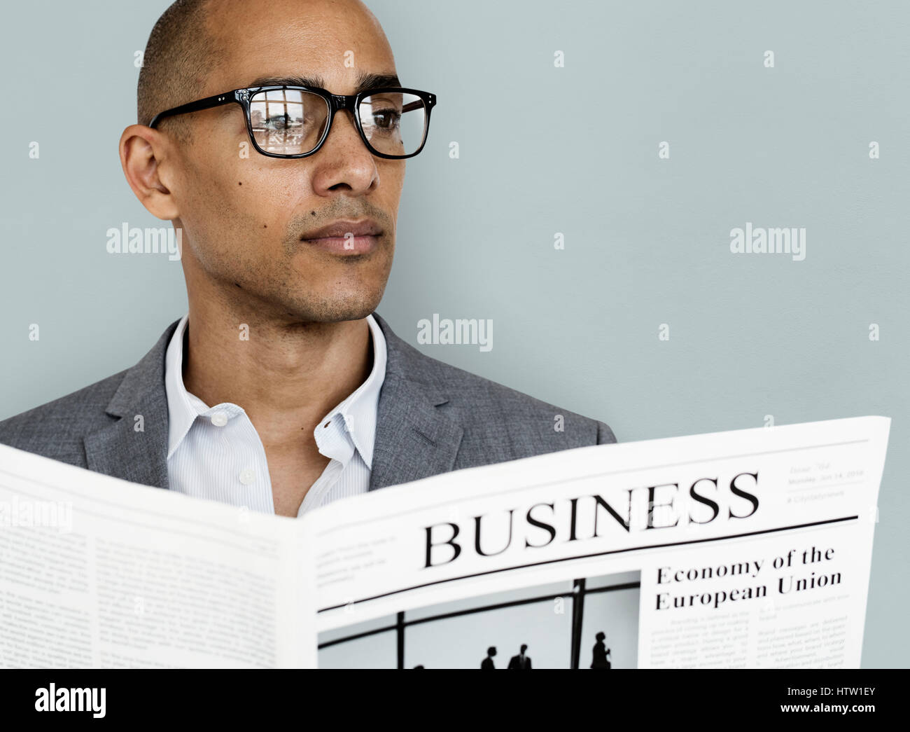 African Descent Business Man Newspaper Concept Stock Photo - Alamy