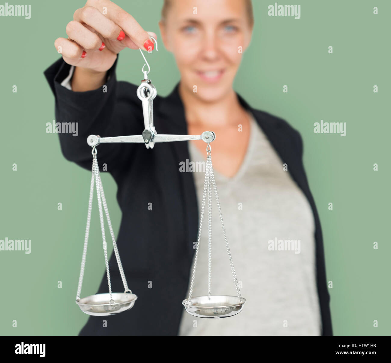 Business woman balance scale hi-res stock photography and images - Alamy
