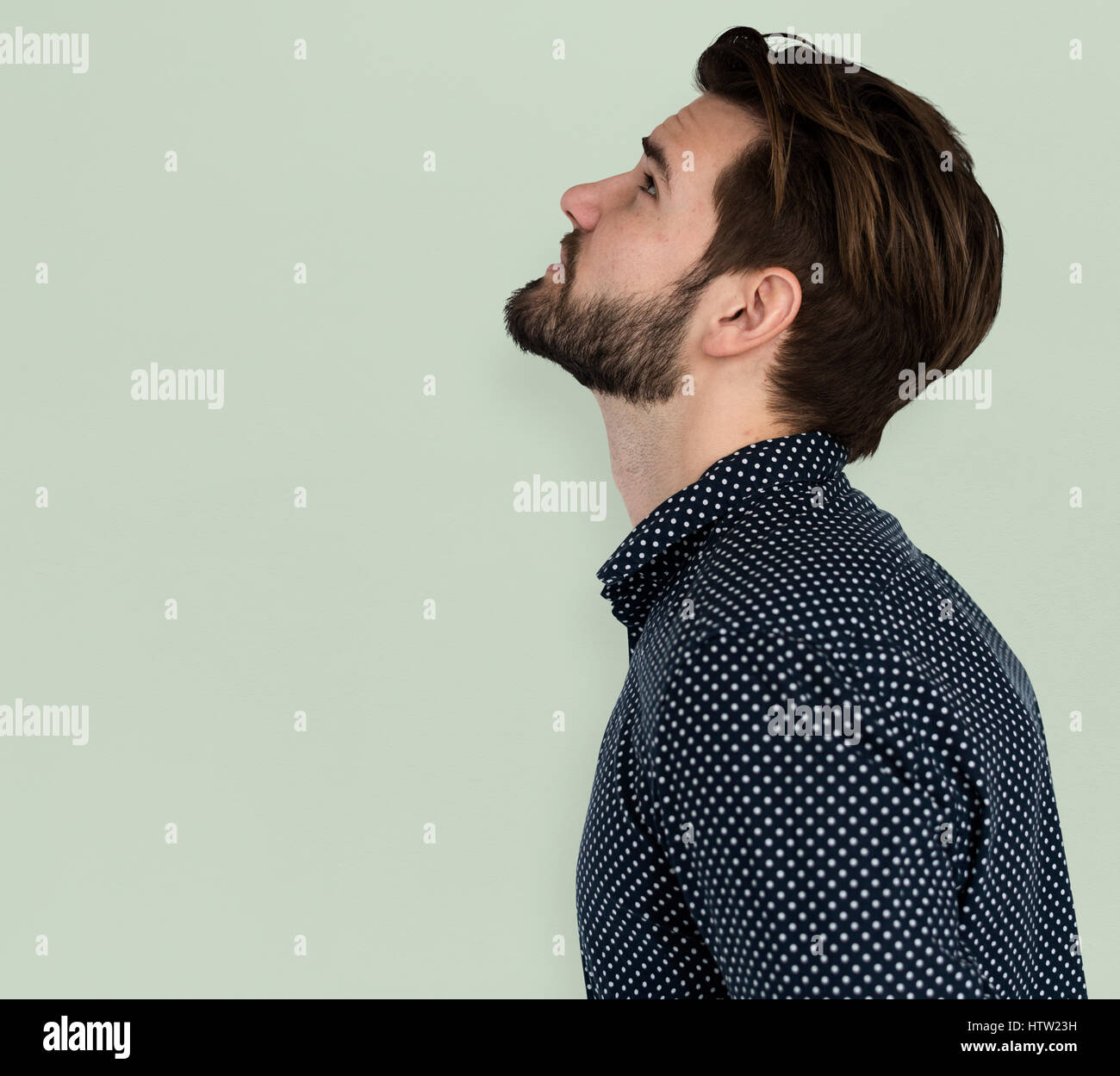 Man Curious Thinking Look up SIde View Portrait Stock Photo - Alamy