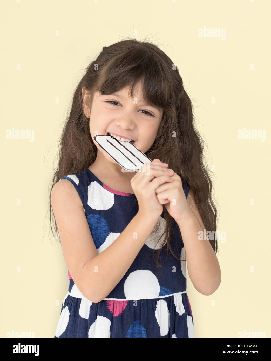 Happy kid girl eating icecream hi-res stock photography and images - Alamy