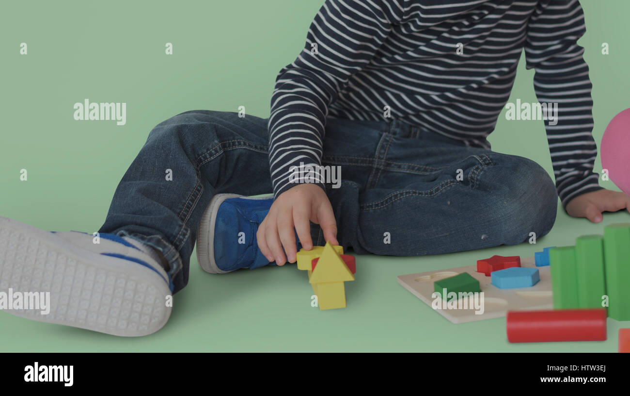 Caucasian Boy Focused Concentrated Play Stock Photo - Alamy