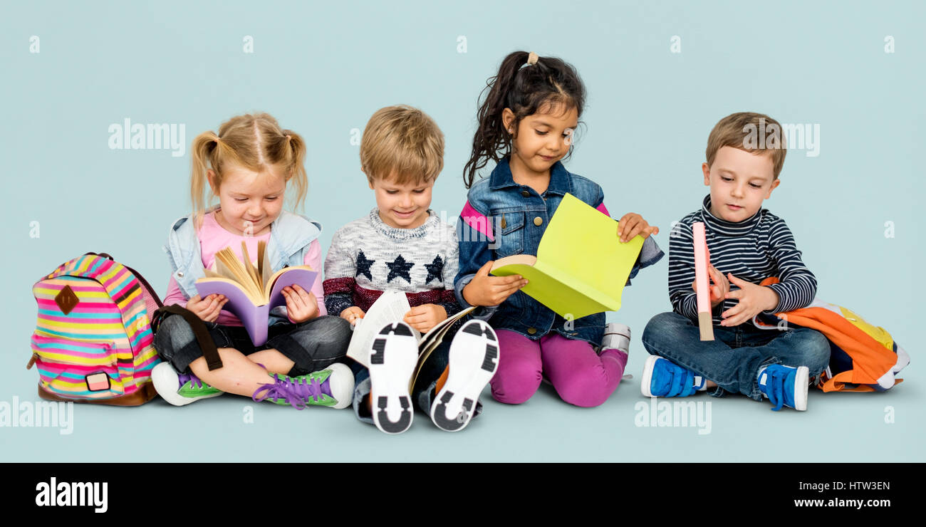 Little Kids Reading Book Cheerful Stock Photo - Alamy