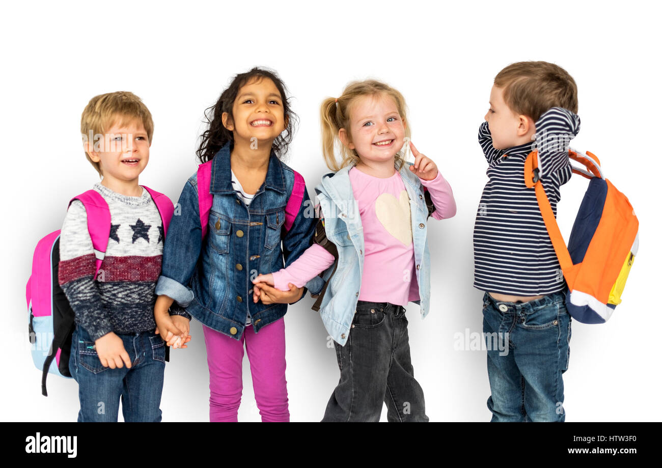 Little Kids Holding Hands Carrying Backpacks Stock Photo - Alamy