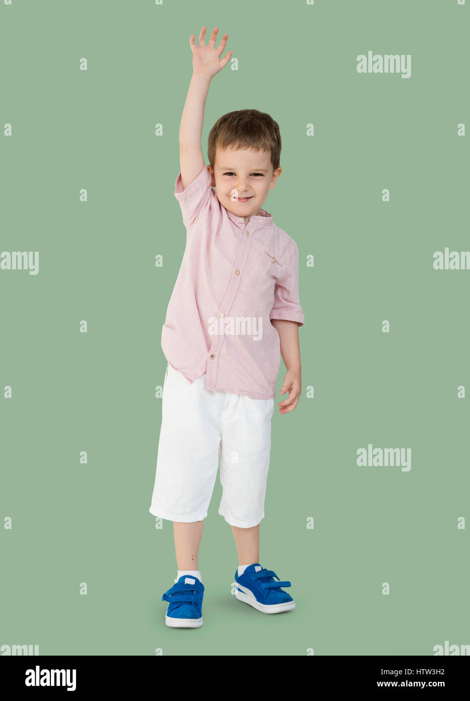 Caucasian Little Boy Cheerful Raising Hand Stock Photo - Alamy