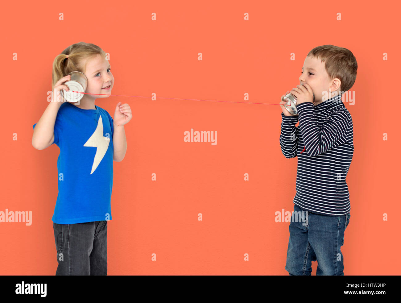Little Kids Using String Phone Adorable Cute Stock Photo - Alamy