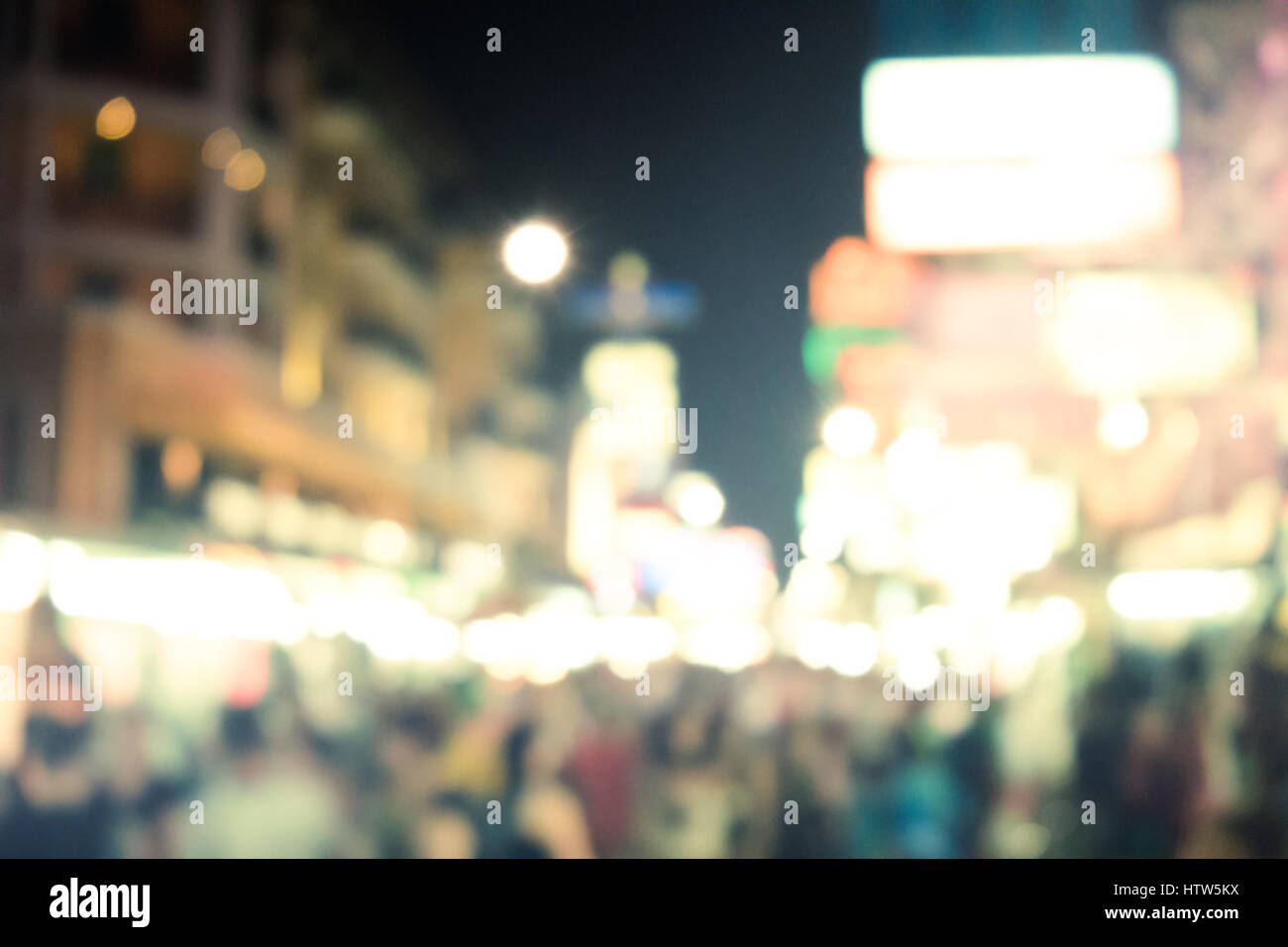 Blurred image of busy night life in the city. Defocused photo of night ...