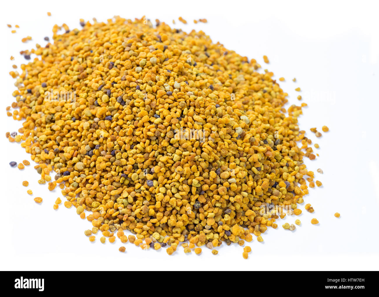 pile of organic Natural bee pollen isolated on a white background ...