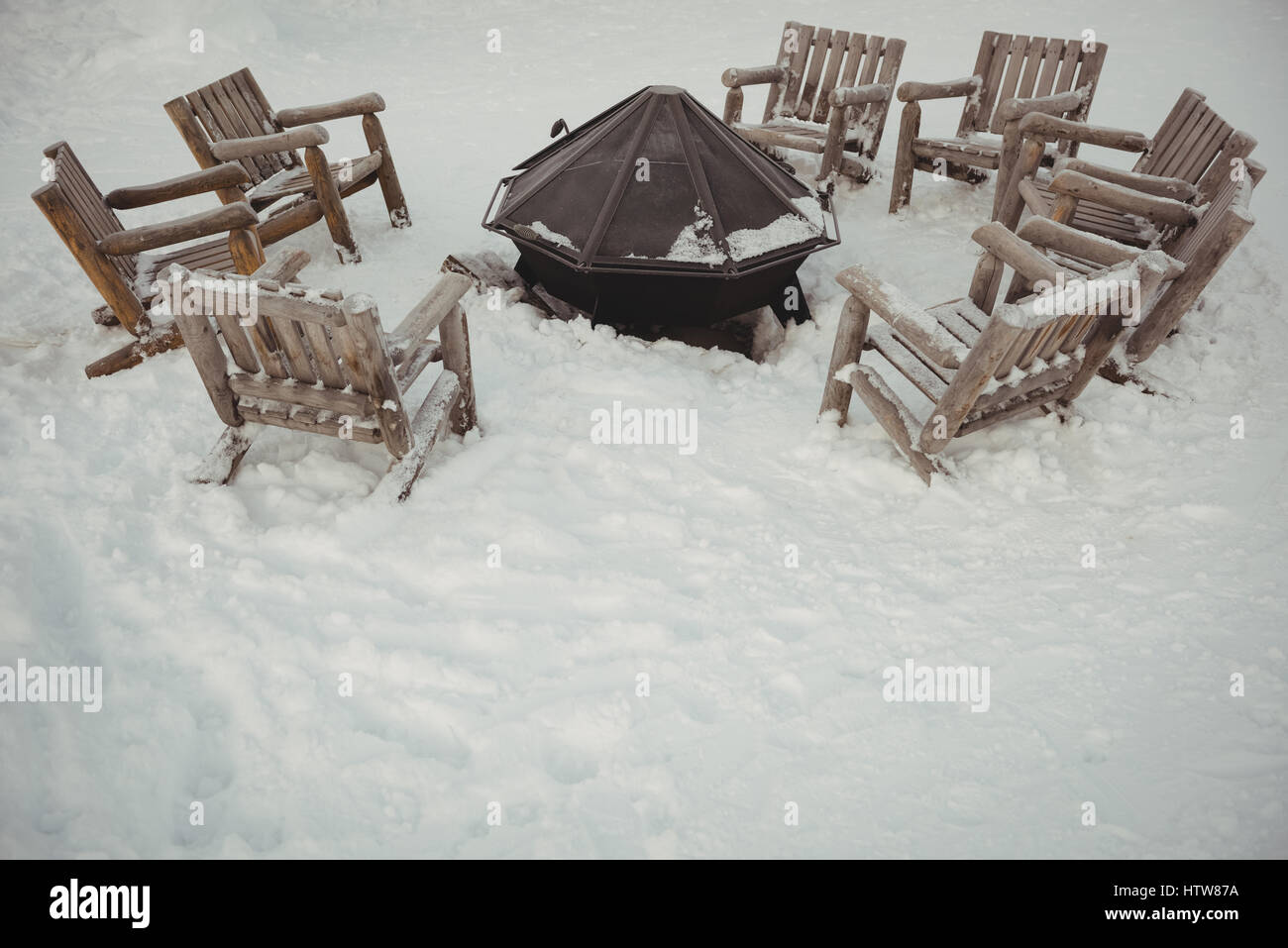 Seating area around the bonfire Stock Photo - Alamy