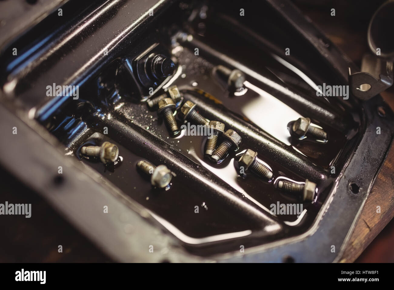 Close-up of nut and bolt in tray Stock Photo - Alamy