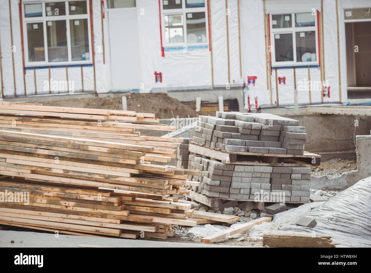 Wooden planks at construction site Stock Photo - Alamy