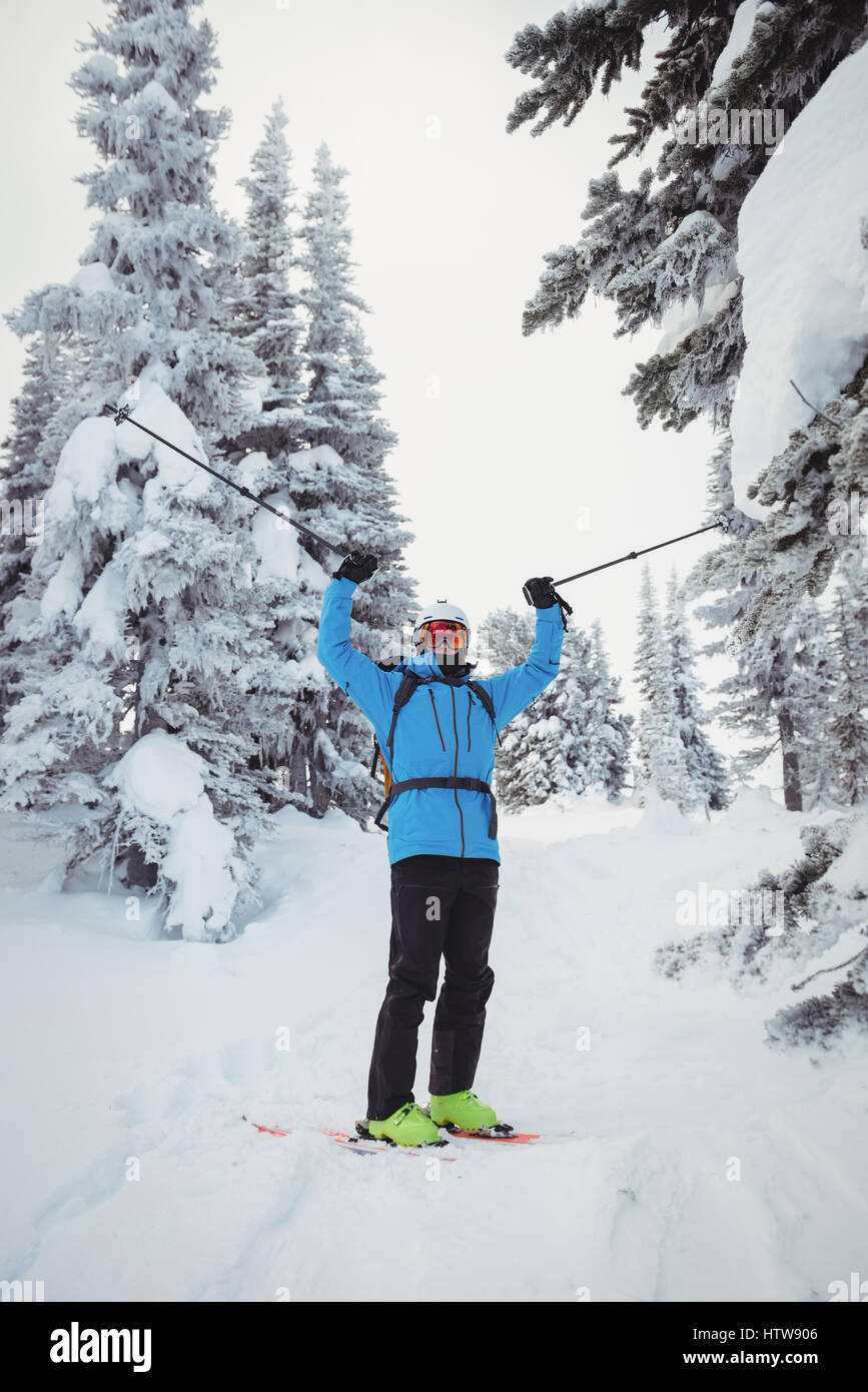 Male skier standing on slope hi-res stock photography and images - Alamy