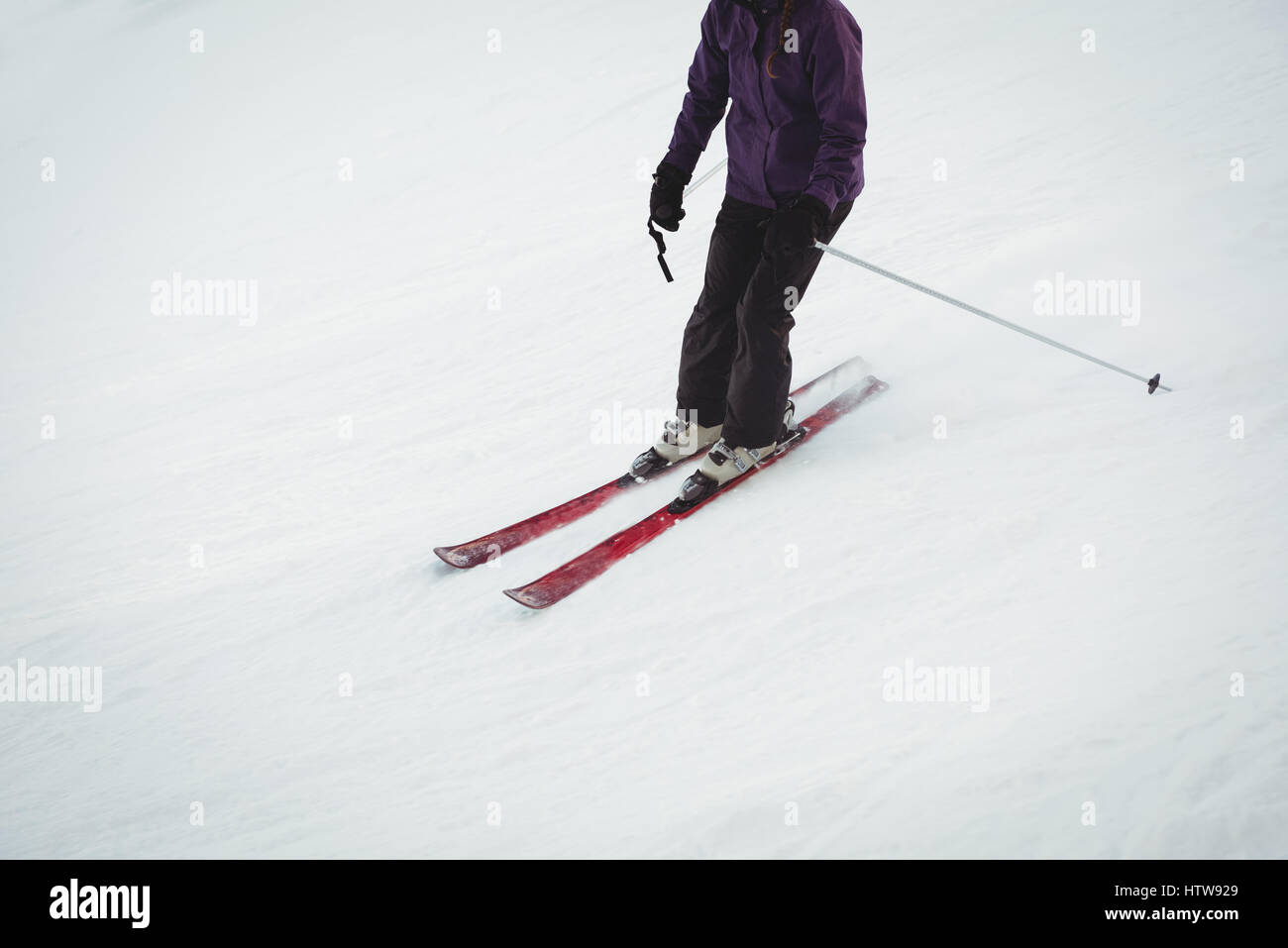 Skier on snow covered hi-res stock photography and images - Alamy