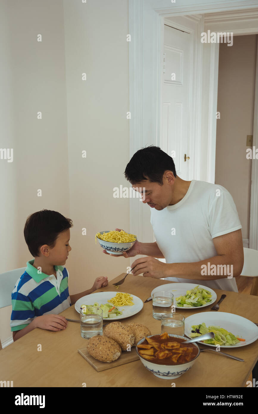 Child serving food hi-res stock photography and images - Alamy
