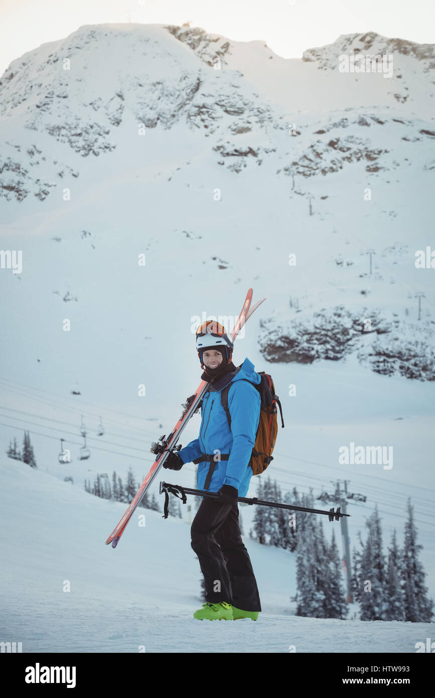 Male skier standing on slope hi-res stock photography and images - Alamy