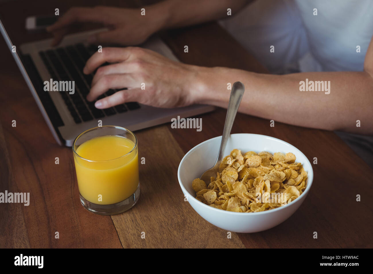 Laptop and breakfast hi-res stock photography and images - Alamy