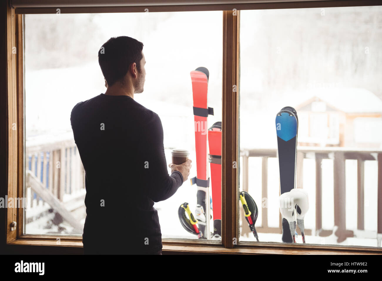 Man in front of window Stock Photo - Alamy