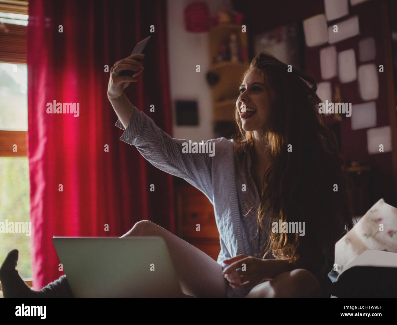 Beautiful woman taking a selfie Stock Photo - Alamy