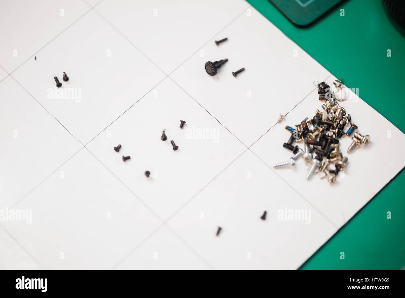 Various screws on table Stock Photo - Alamy