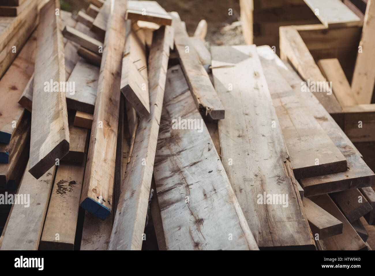 Wooden planks at construction site Stock Photo - Alamy