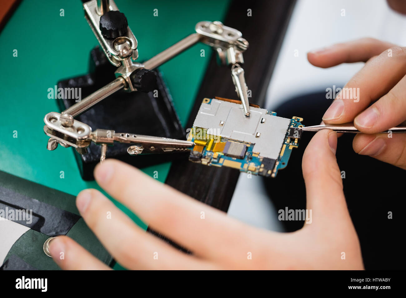 Mobile phone repairing Stock Photo - Alamy