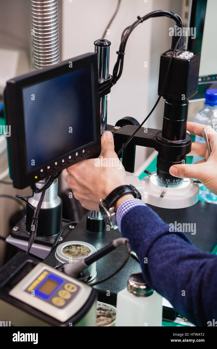 Electronic repairing machine Stock Photo - Alamy