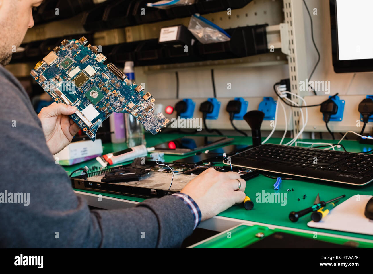 Disassembling laptop hi-res stock photography and images - Alamy