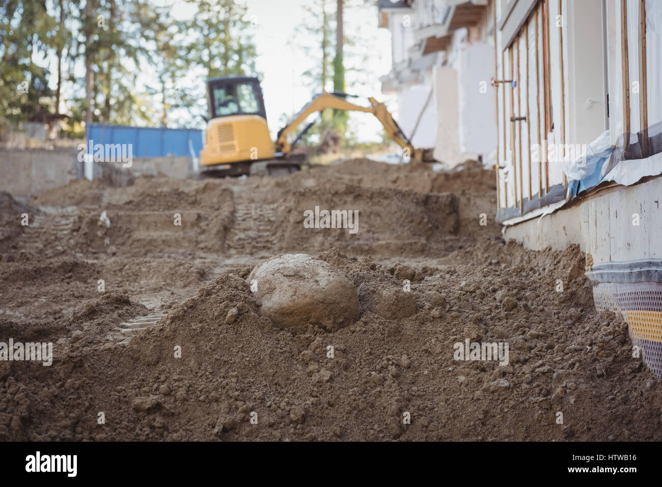 Heap of mud at construction site Stock Photo - Alamy