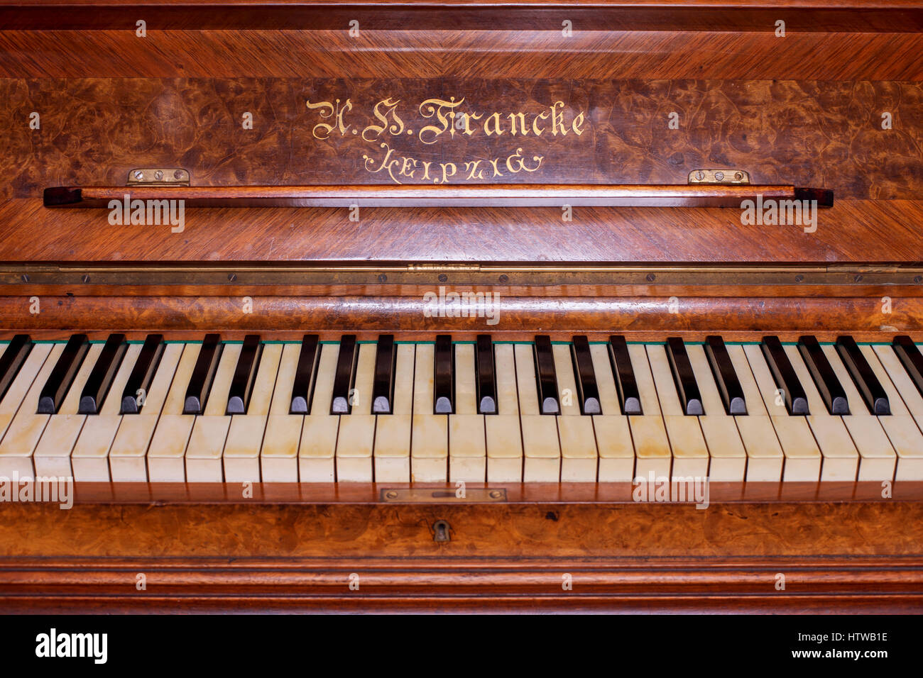 Piano keys of an old German piano close up Stock Photo - Alamy