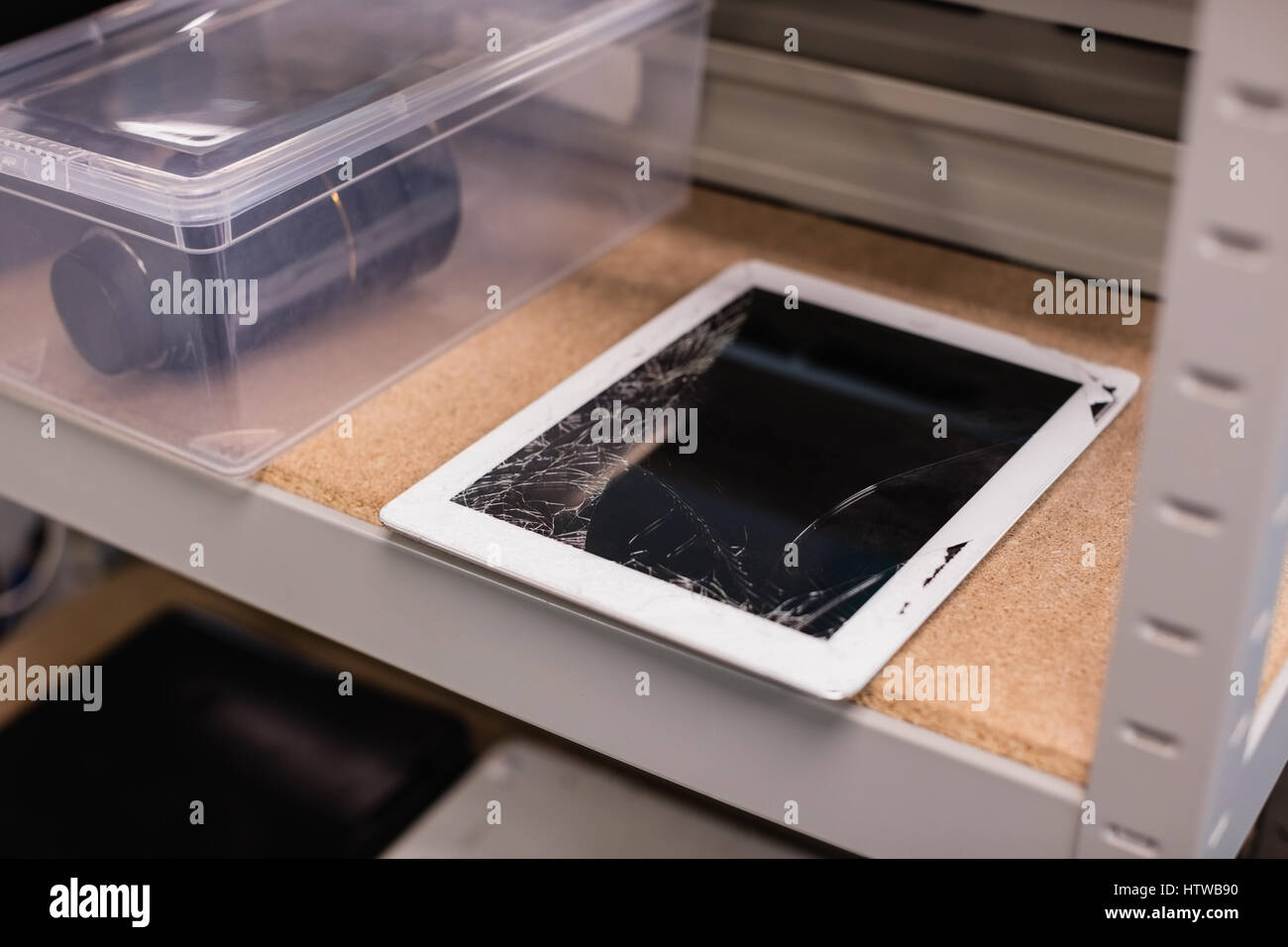 Damaged digital tablet Stock Photo - Alamy