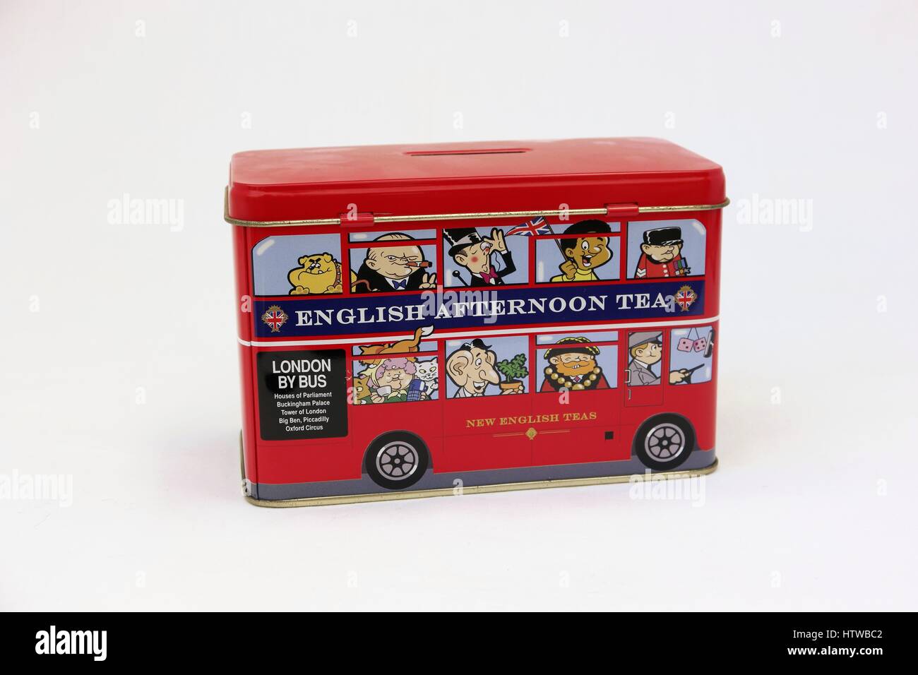 Small piggy bank shaped like a London bus Stock Photo - Alamy