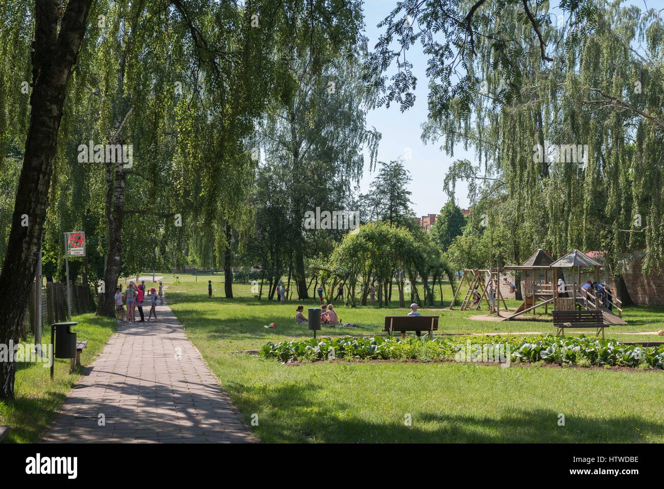 Recreation in a park of Siluté, a small town in the Neman River delta ...