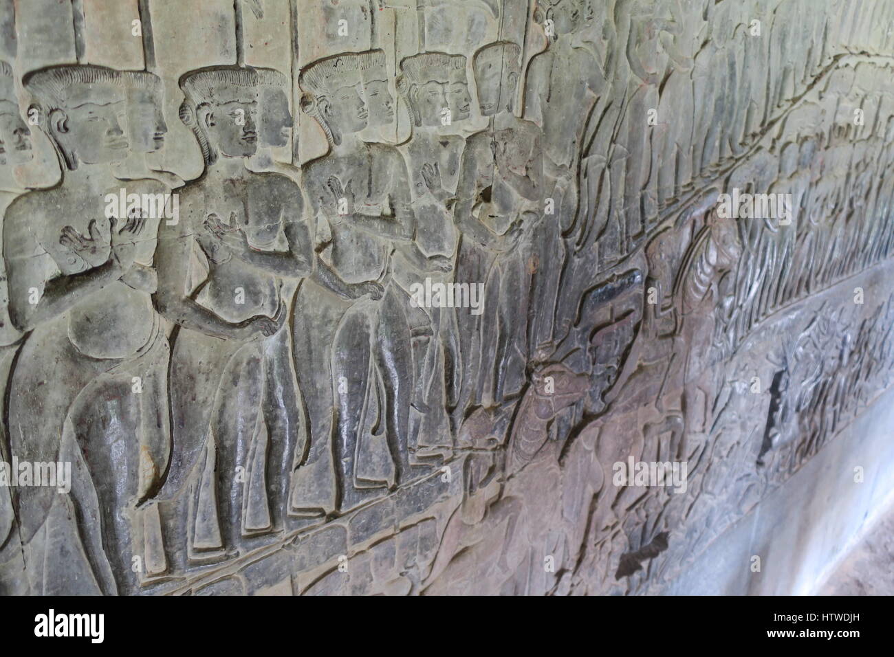 The inner walls of outer gallery of Angkor Wat temple bear series of ...