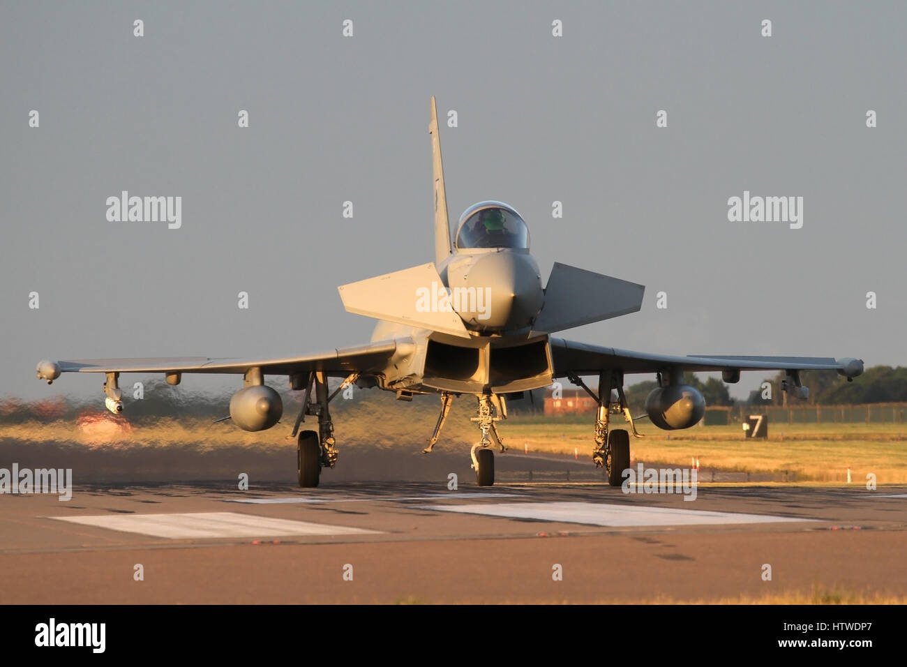 RAF Typhoon rolling out on runway 25 at RAF Coningsby in the 'golden ...