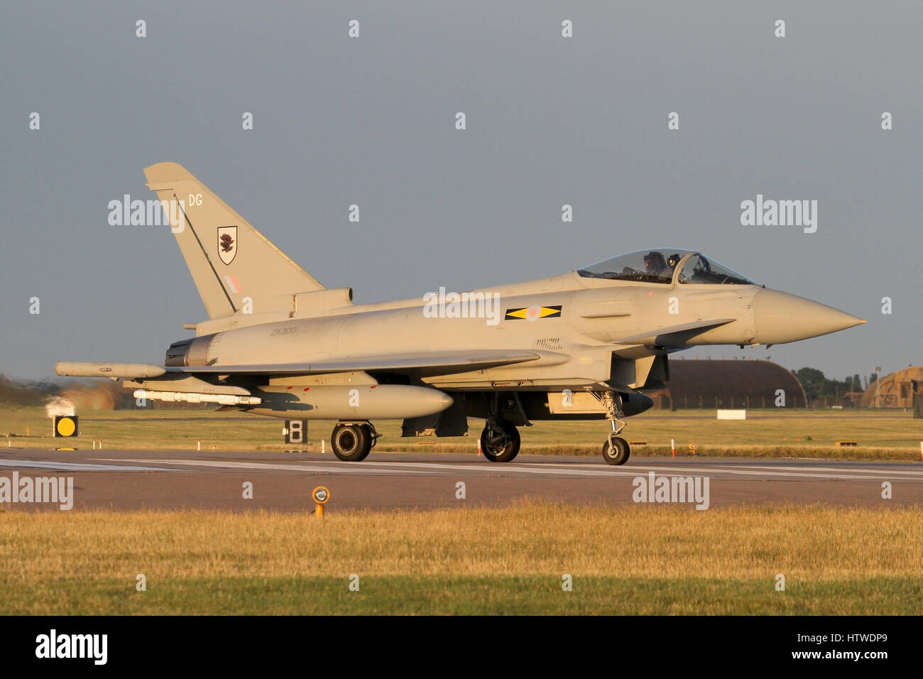 RAF Typhoon rolling off the end of the runway after landing at RAF ...