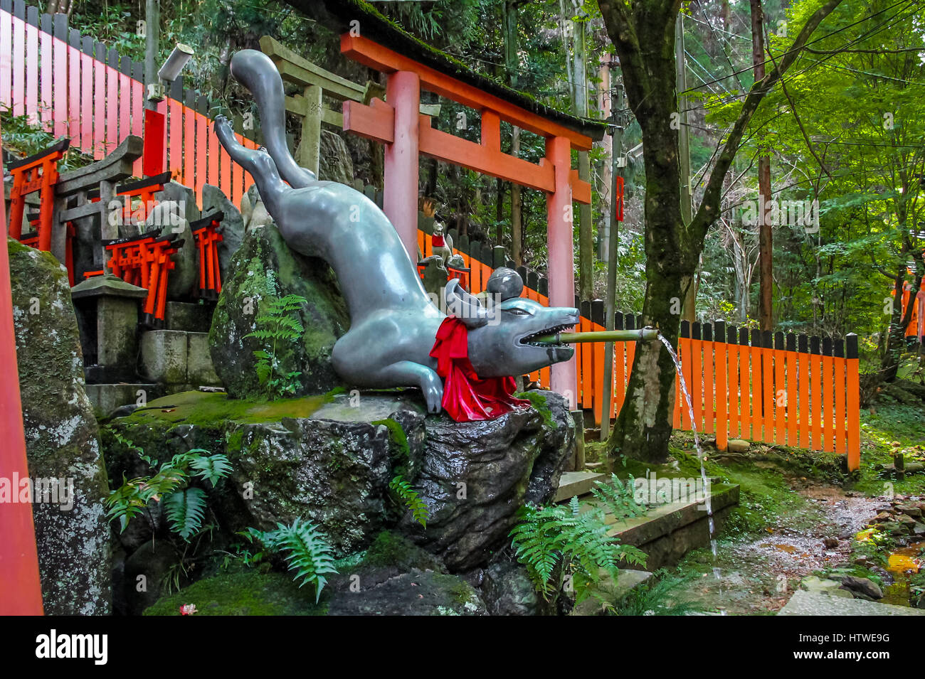 Fox Statue Water fountain in Fushimi Inari Shrine - Kyoto, Japan Stock ...