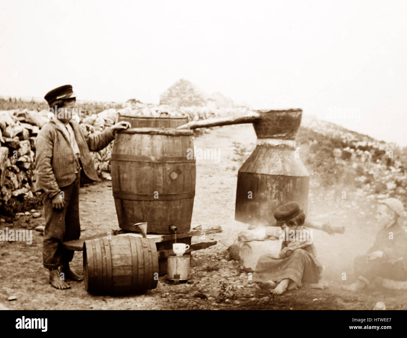 Boys making Poitin in Ireland - Victorian period Stock Photo - Alamy