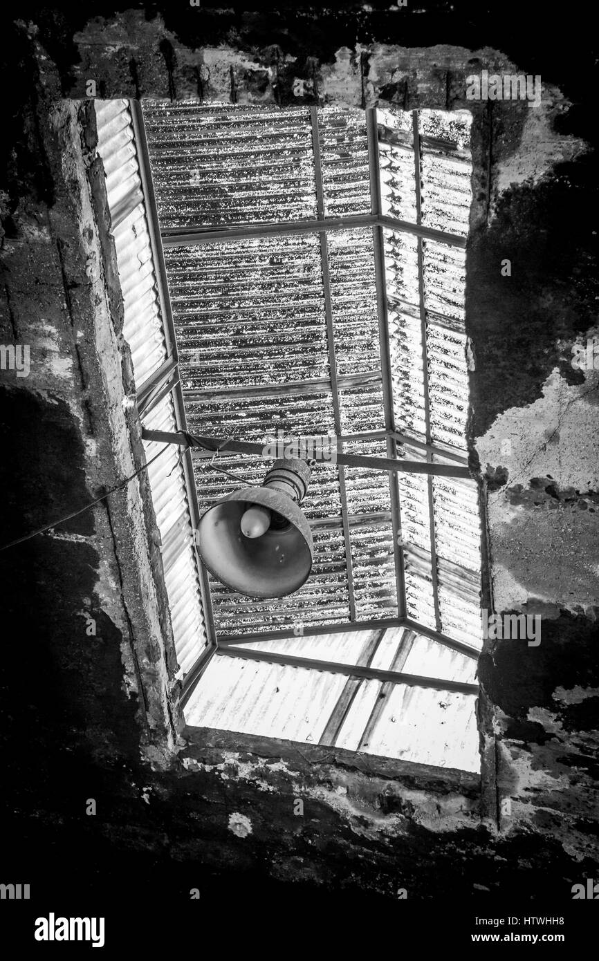 old light on rusty roof Stock Photo - Alamy