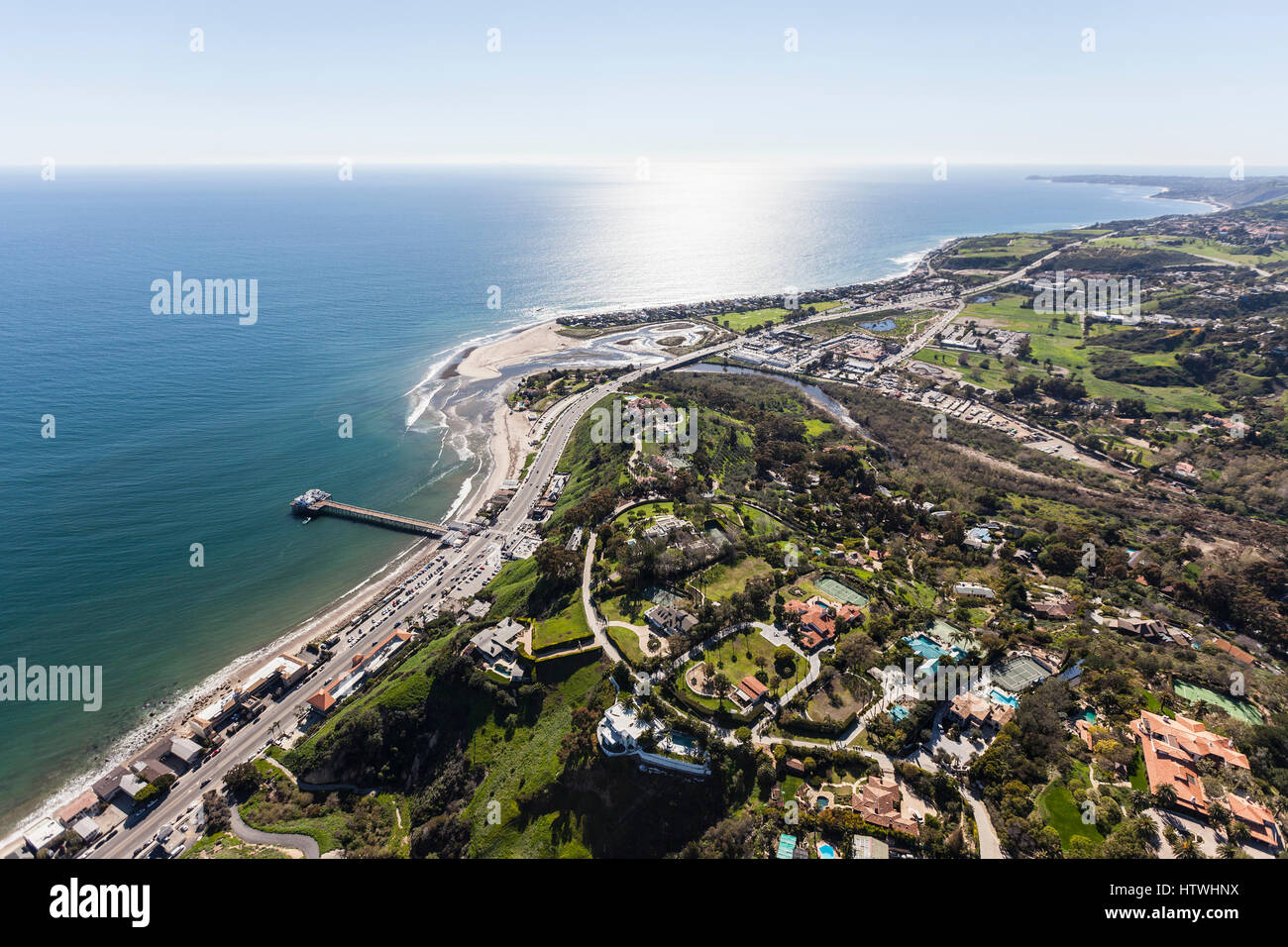 Aerial view of Pacific Ocean view estates and pier in Malibu ...