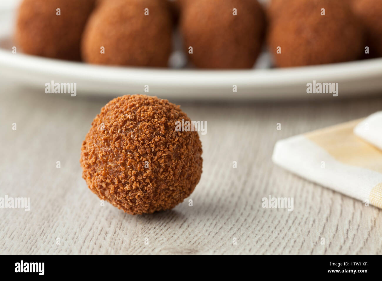 Dutch traditional snack bitterballen with one in front close up Stock ...
