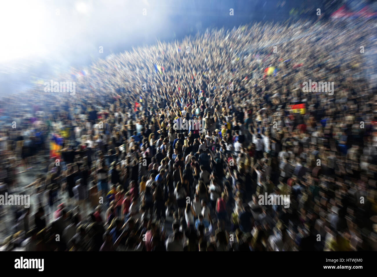 Blurred crowd partying at a music festival. Zoom in effect Stock Photo ...