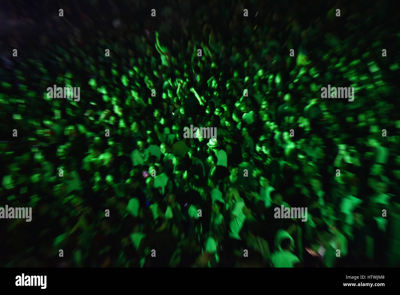Blurred crowd partying at a music festival. Zoom in effect Stock Photo ...