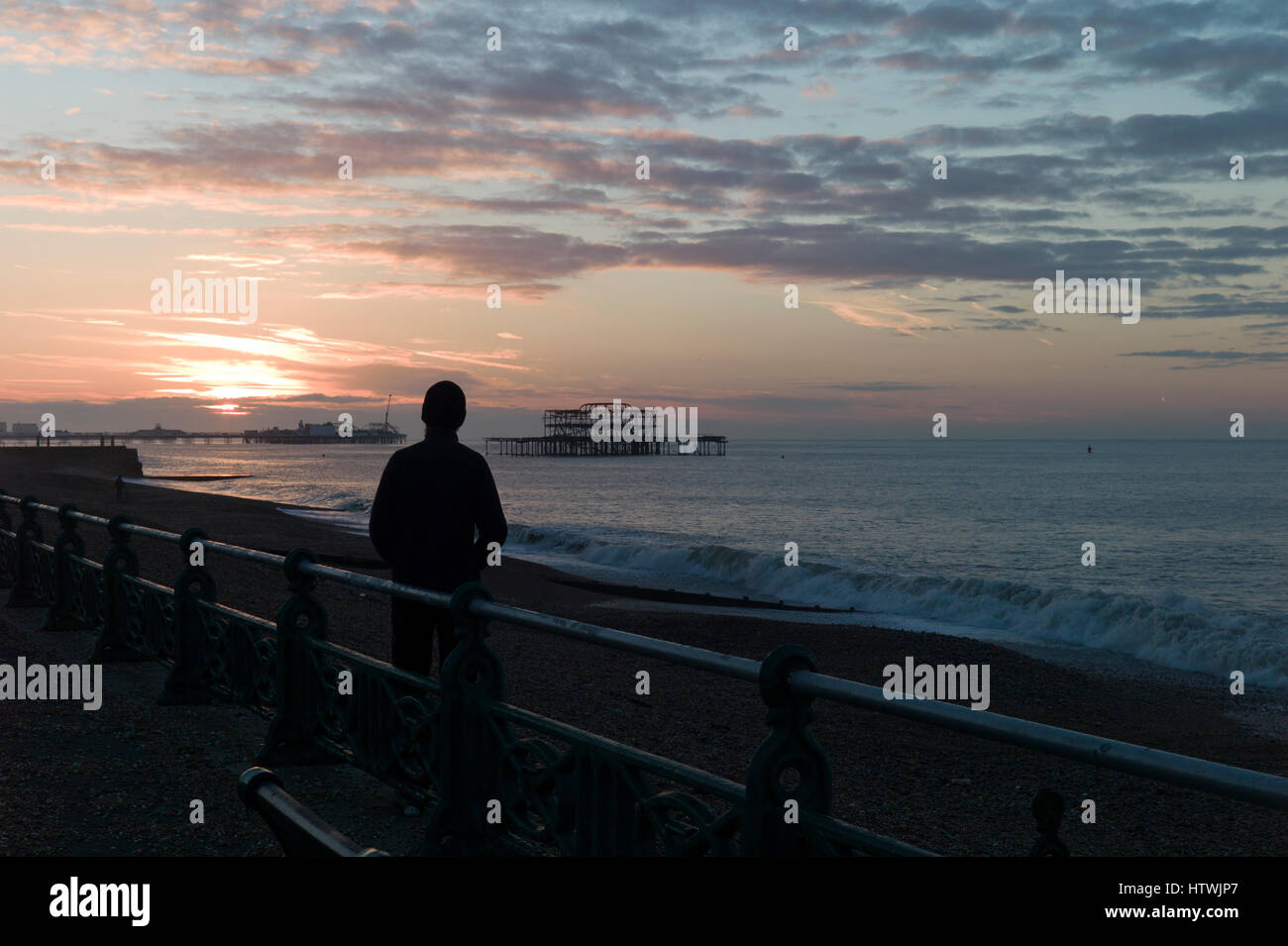 Figure watching over hi-res stock photography and images - Alamy