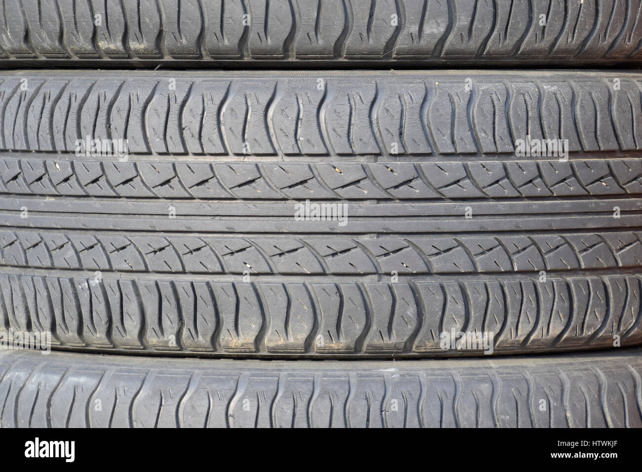 The background of the tread pattern of the car wheel. Rubber tires ...